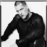 An interview with Larry Scott (Various Editorials)