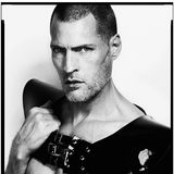 An interview with Larry Scott (Various Editorials)