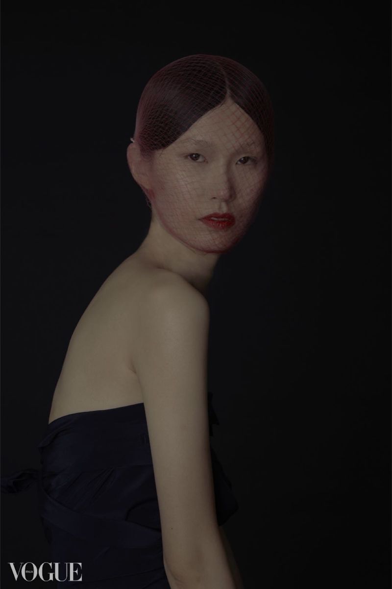 Chenxi in netting (Vogue.it)